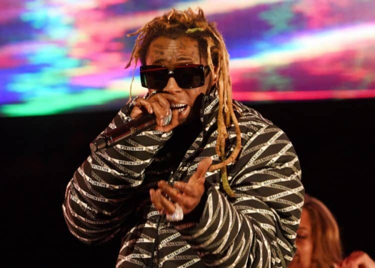 Lil Wayne Celebrates 10th Anniversary of "Tha Carter IV" Album